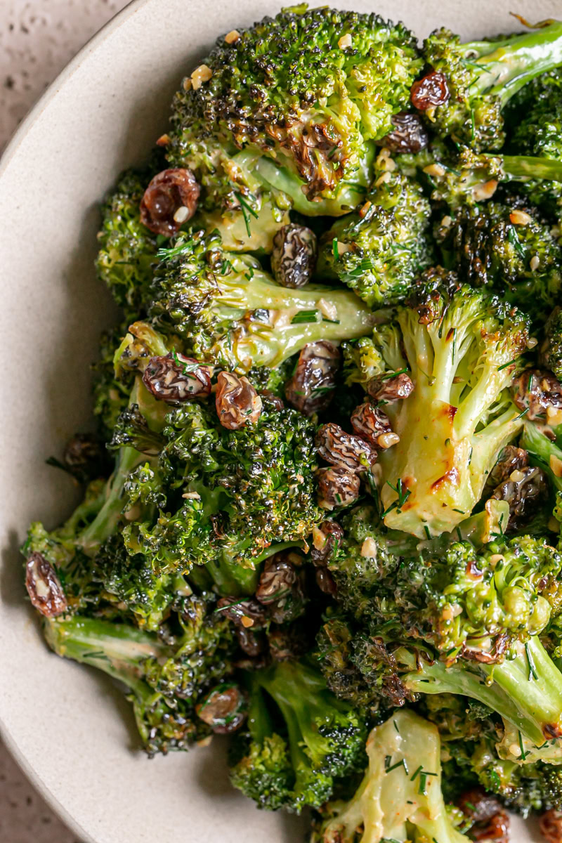 Garlic Roasted Broccoli with Dill Harissa Tahini and Raisins - Healthy ...